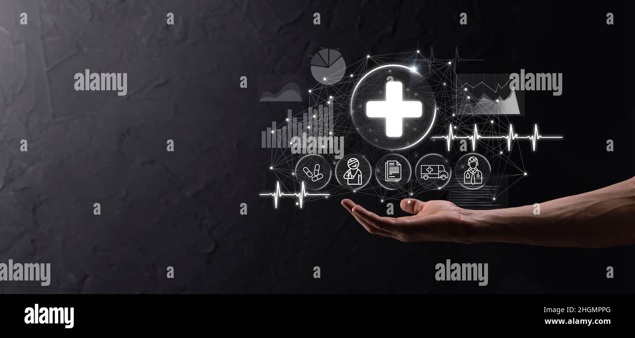 Businessman hold virtual plus medical network connection icons. Covid ...