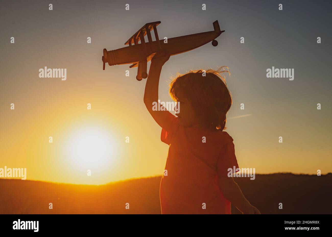 Dreaming kid. Boy pilot aviator with airplane. Dreams of traveling ...