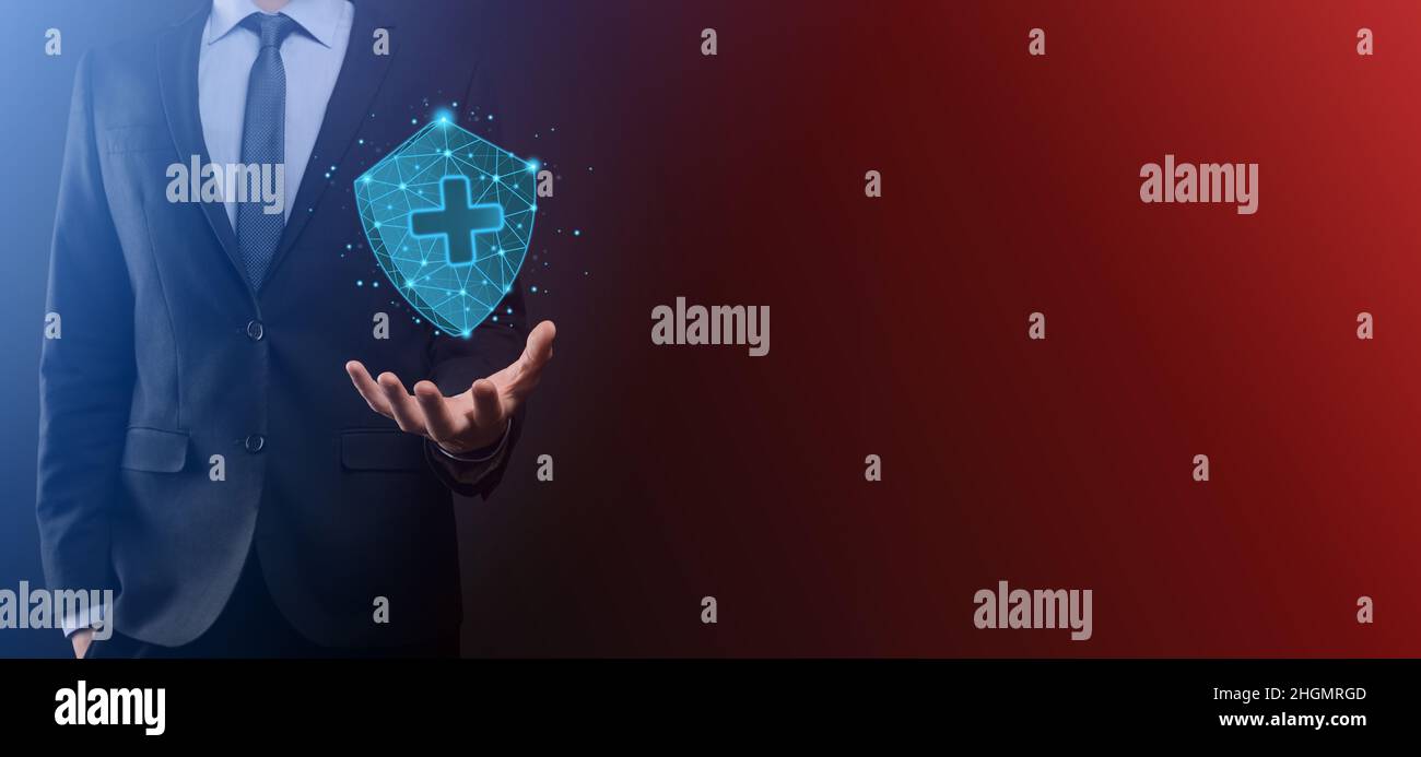 Businessman hold Shield with plus Low polygonal icon, medicine icon ...
