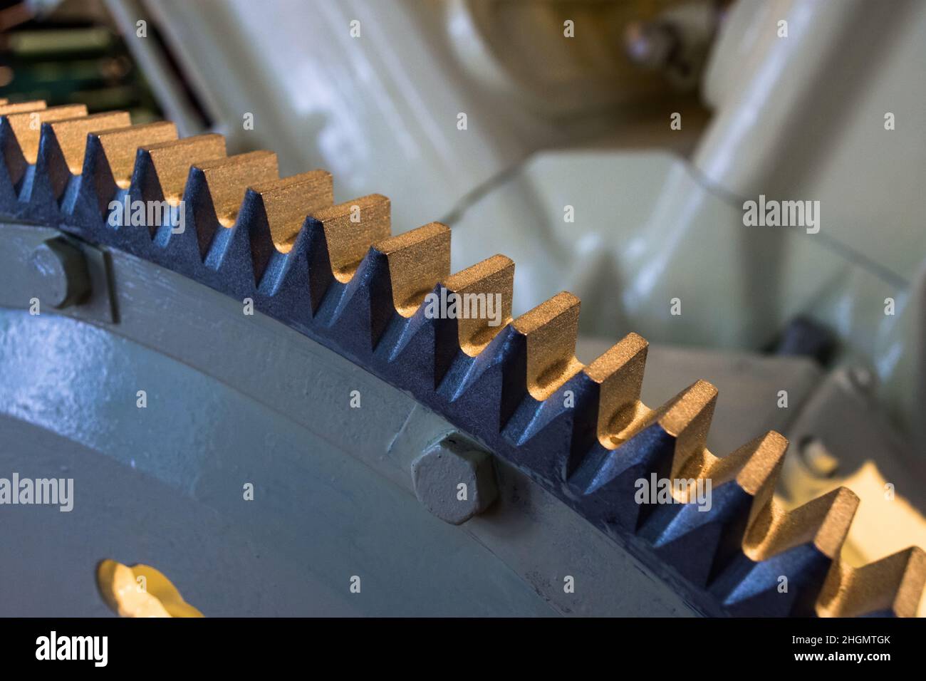 Metal big gear teeth machine close up Stock Photo - Alamy