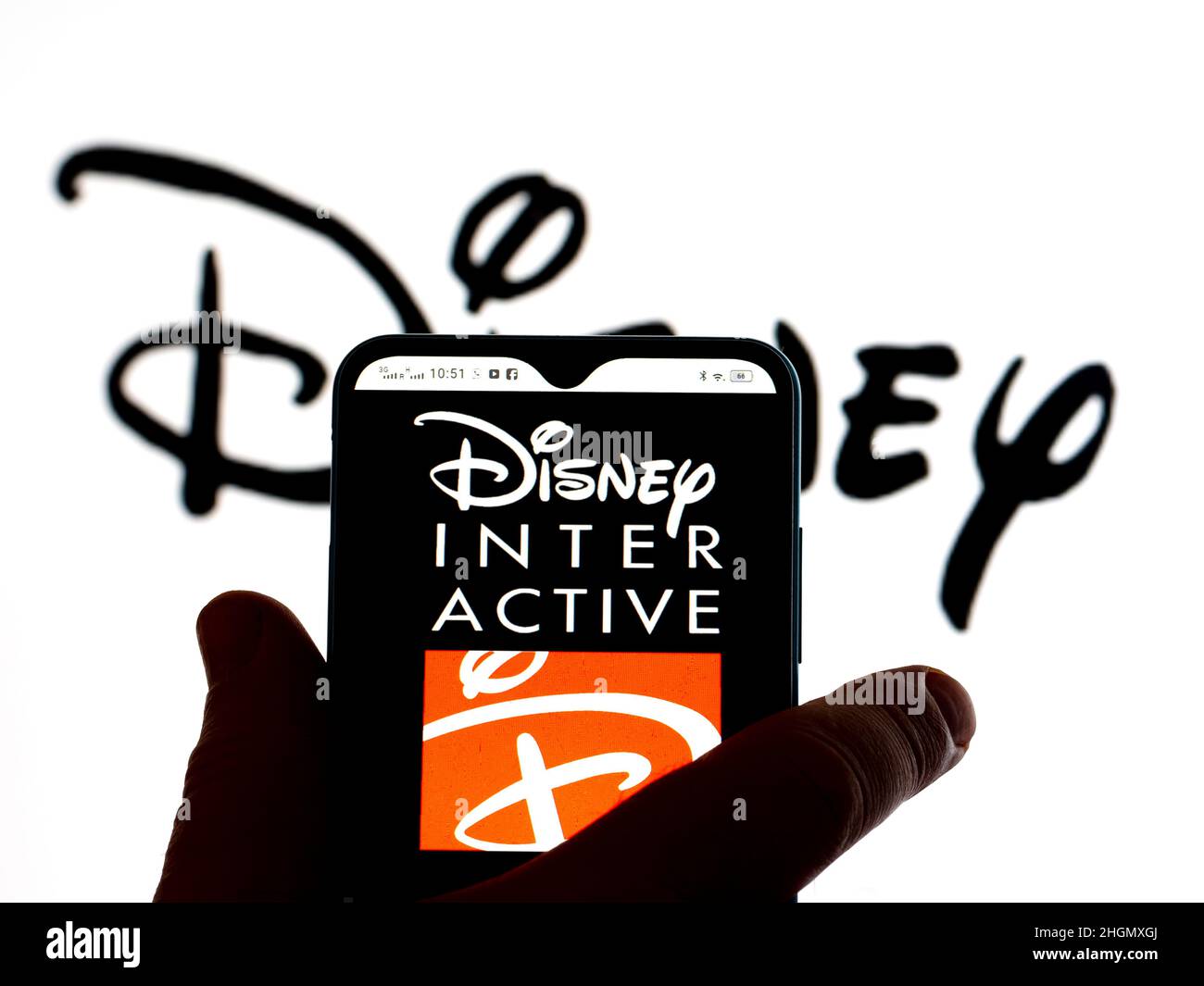 In this photo illustration, the Disney Interactive logo is seen ...