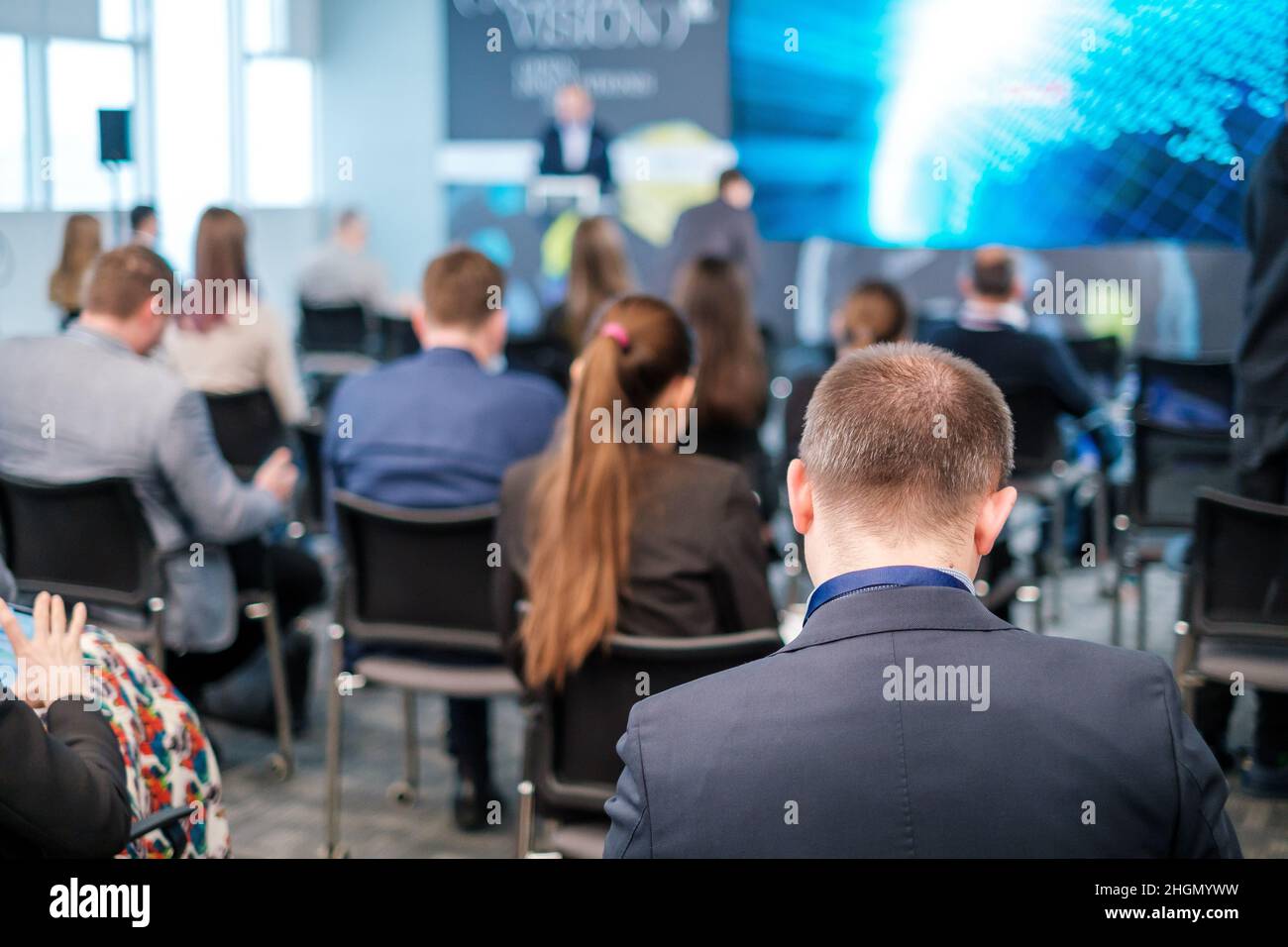 Group of entrepreneurs in conference hall Stock Photo - Alamy