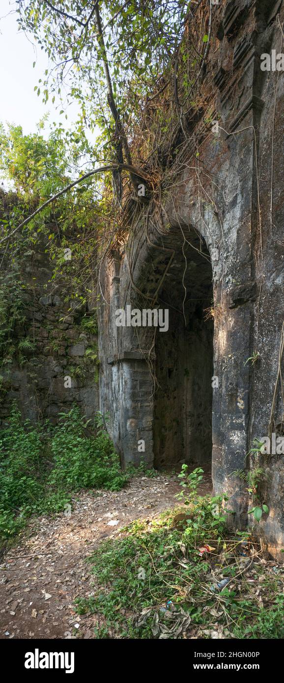 Abandoned ancient entrance gate of Revdanda Fort near Alibag state ...