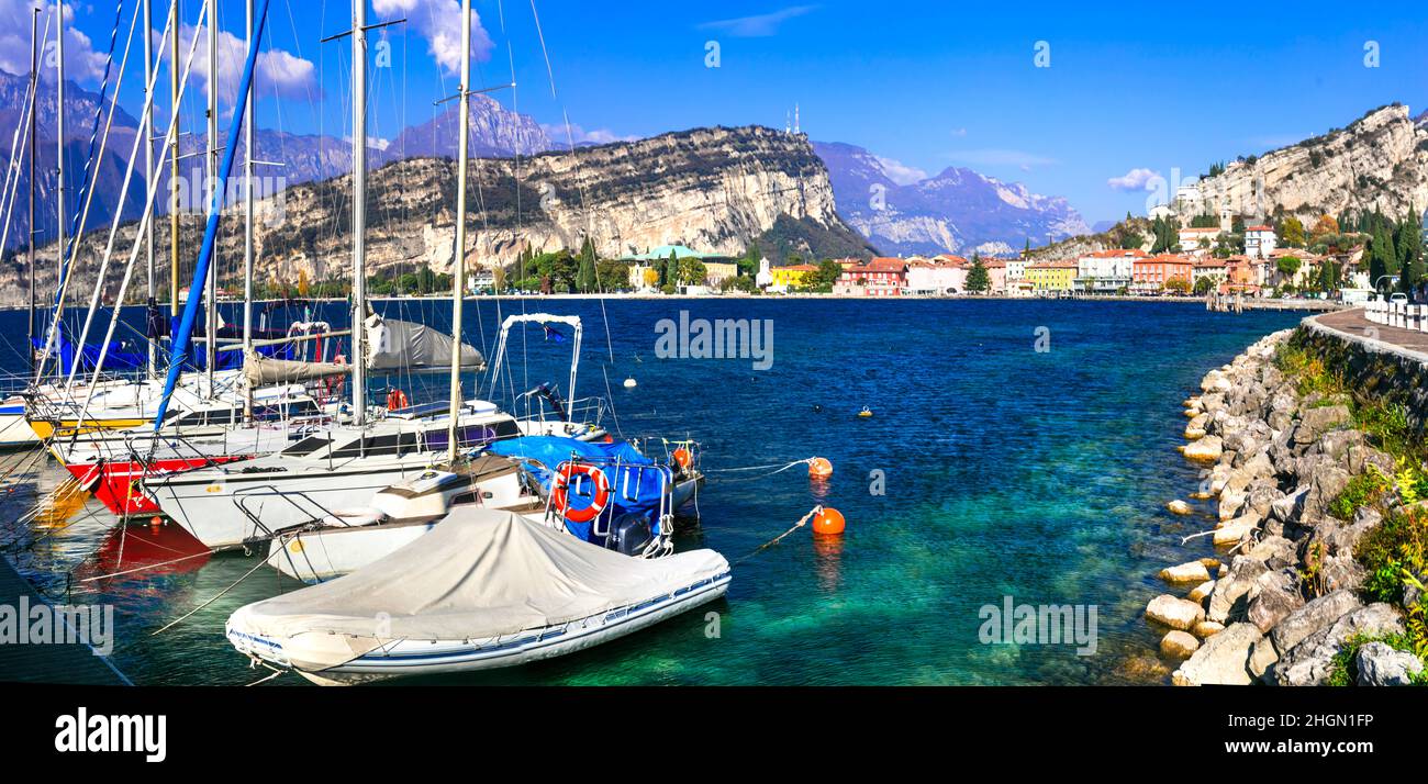 Beautiful lake Lago di Grada. Panoramic view of Torbole village with ...
