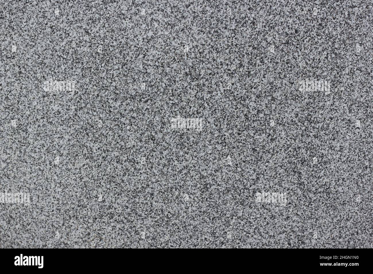 A smooth piece of gray granite stone Stock Photo - Alamy