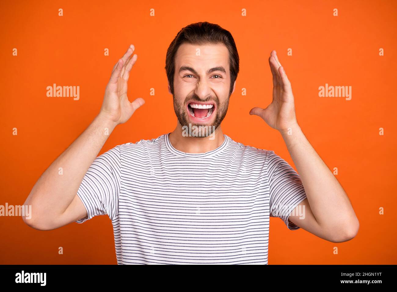 Photo of young guy hold arms shout anxious failure conflict problem ...