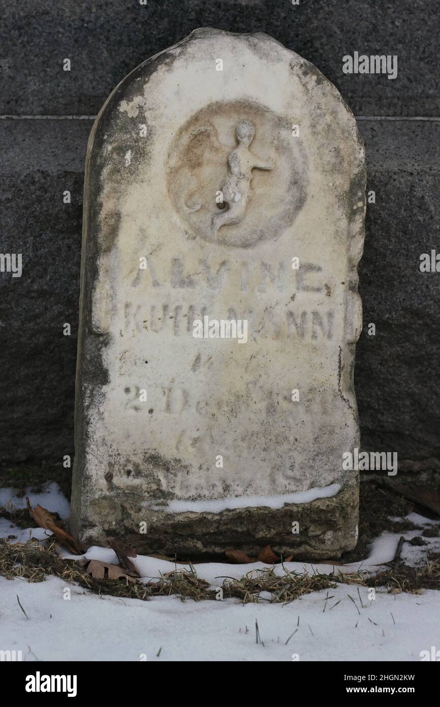 Centuries old stone gravestone still standing in the cemetery Stock ...