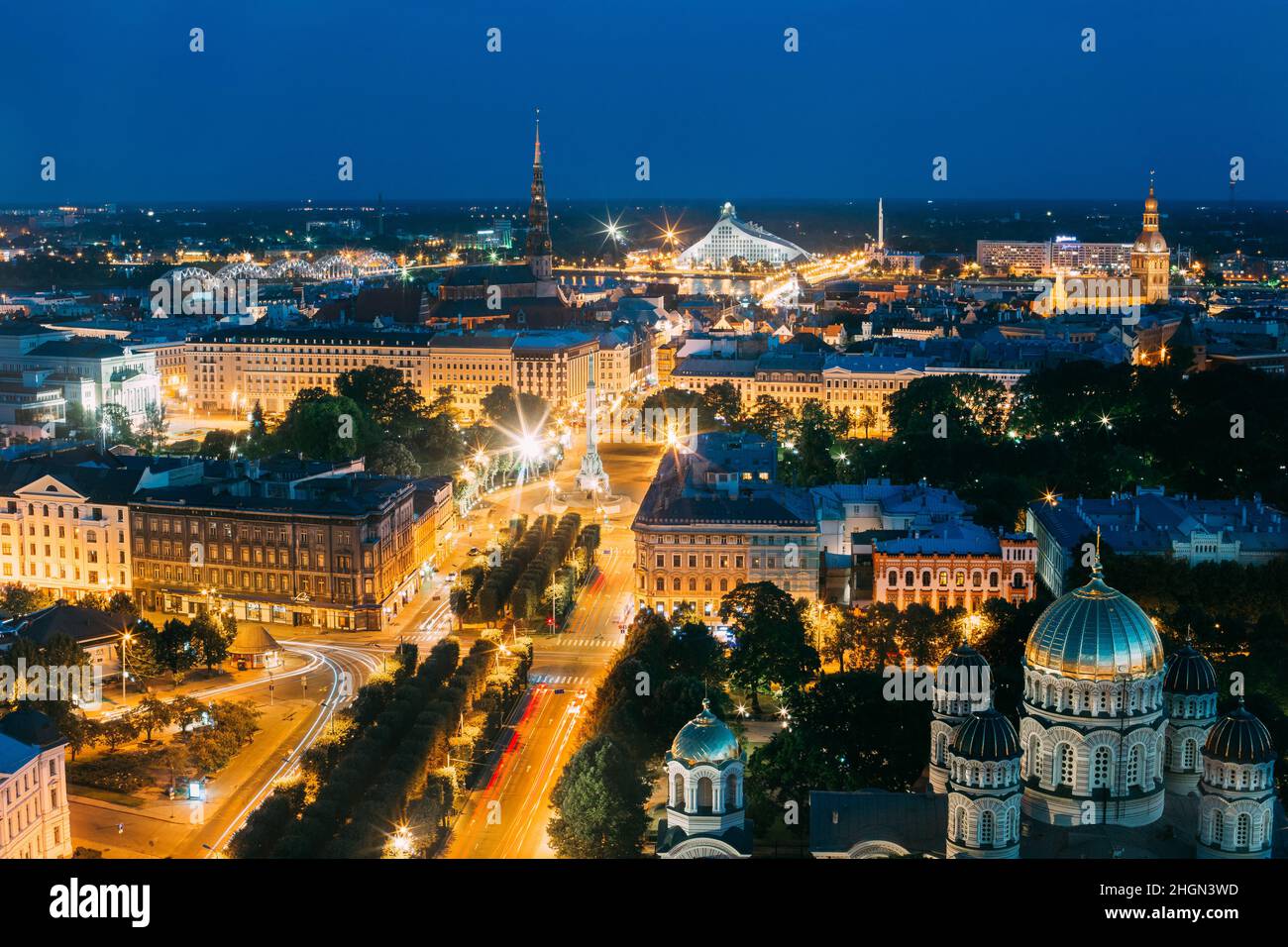 Riga, Latvia. Cityscape With Famous Landmarks St. Peter's Church ...