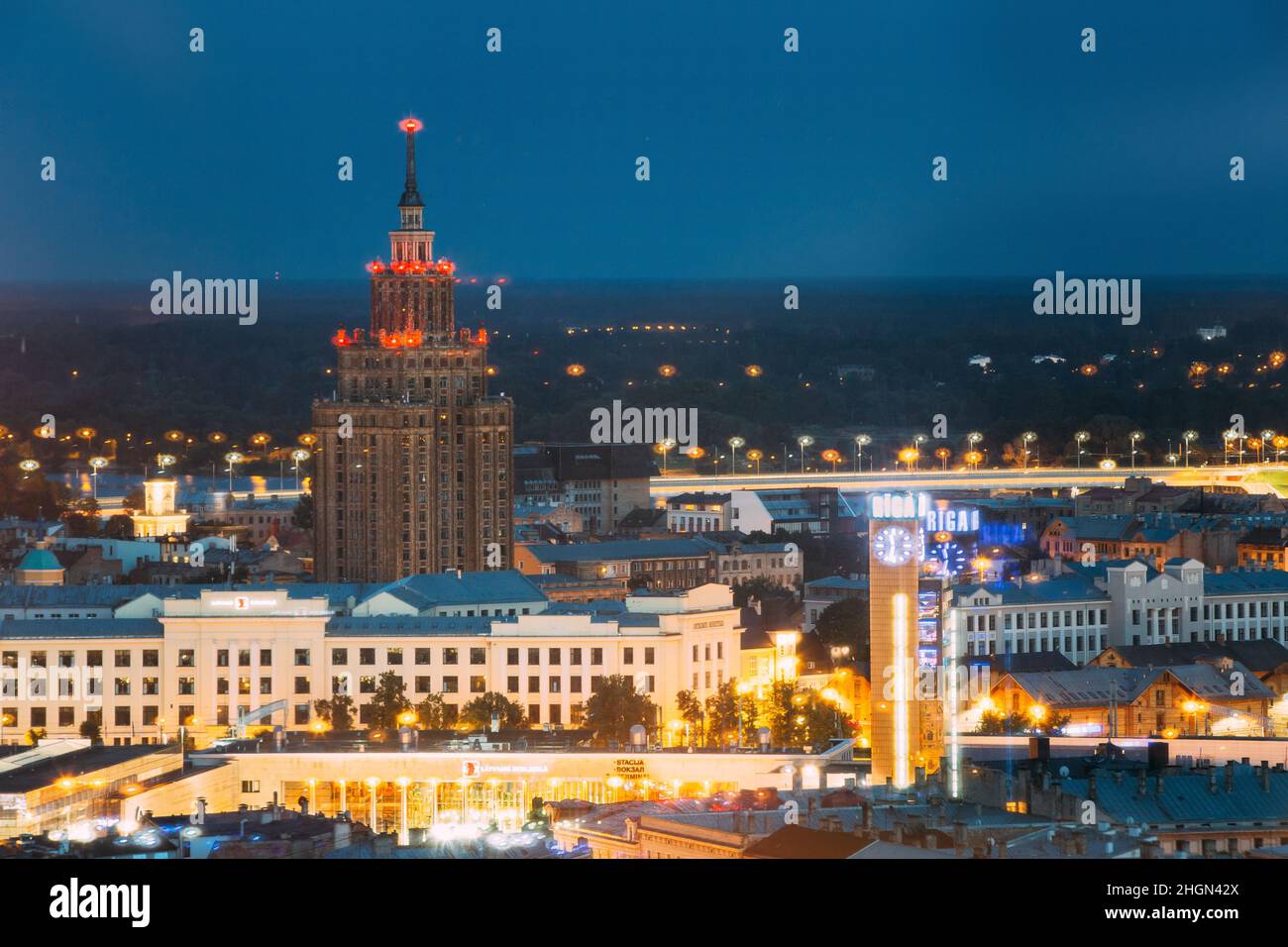 Riga, Latvia. Aerial View Of Cityscape In Summer Evening Or Night ...