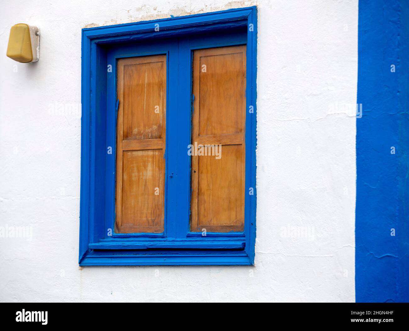 A window closed with weathered wooden shutter Stock Photo - Alamy