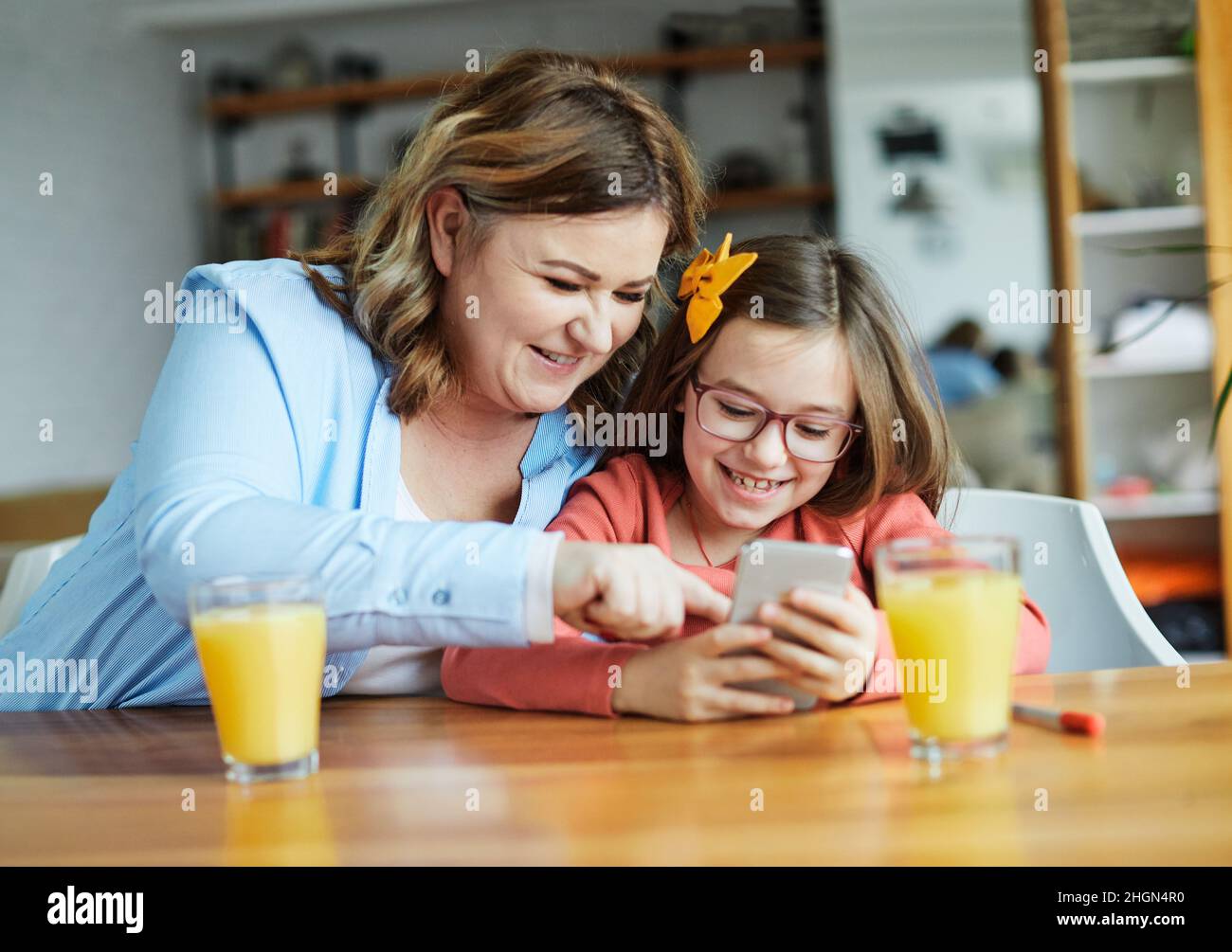 mobile phone smartphone communication mother children daughter girl ...