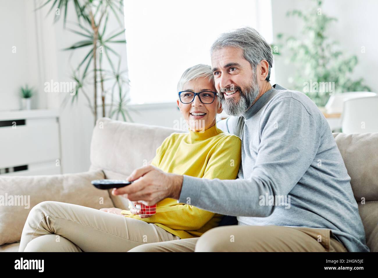senior couple watching tv happy mature television together Stock Photo ...
