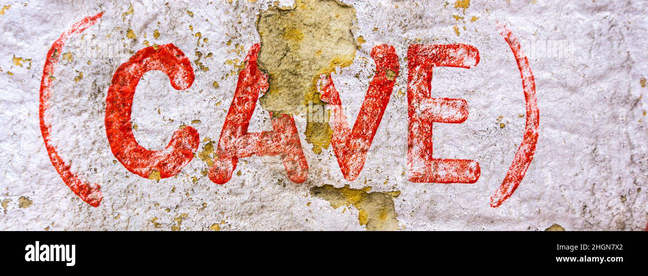 With hand-painted lettering on an old white clay plaster wall Stock ...