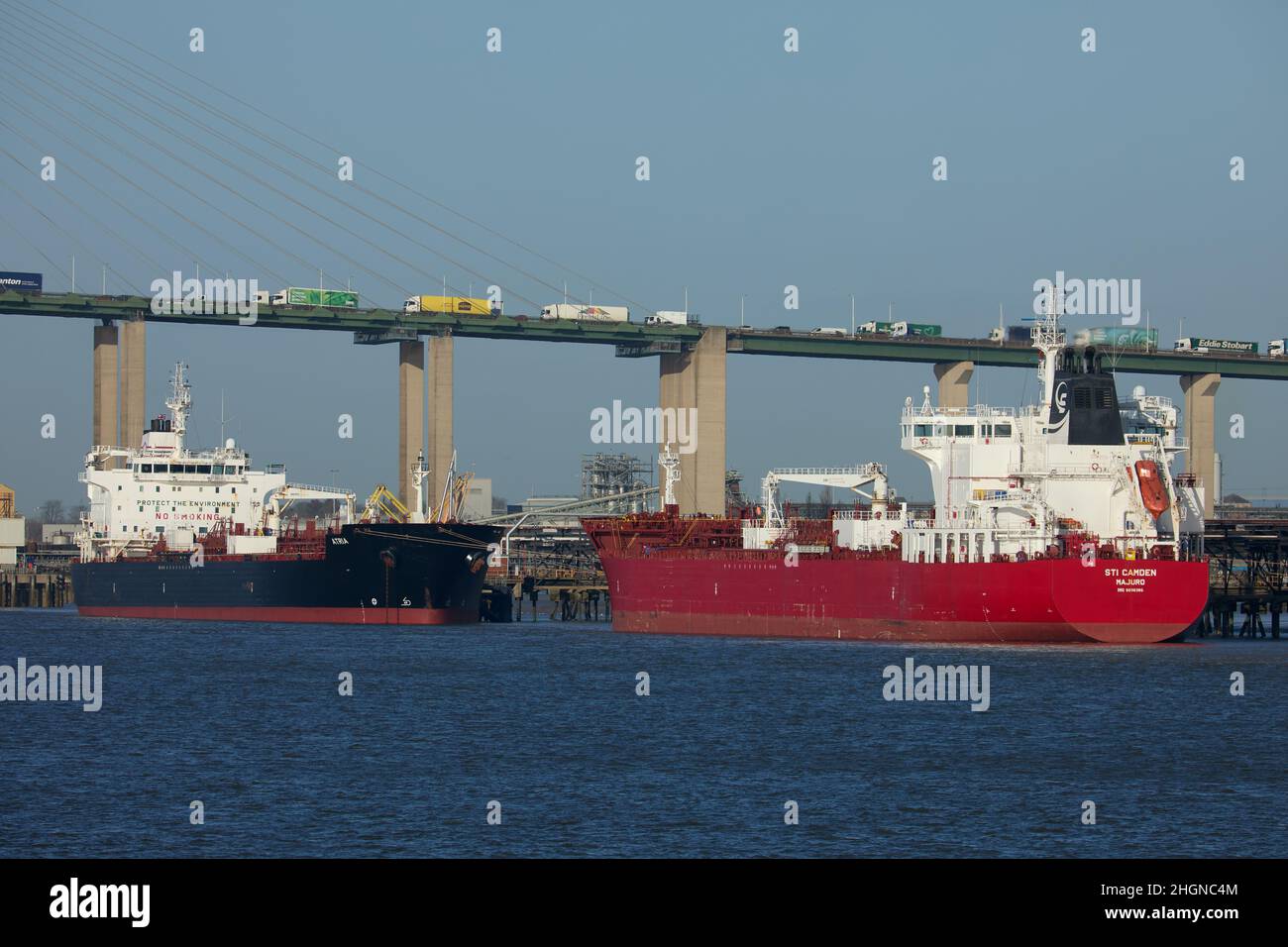 Ships moored at Purfleet docks, with the Dartford Bridge in the ...
