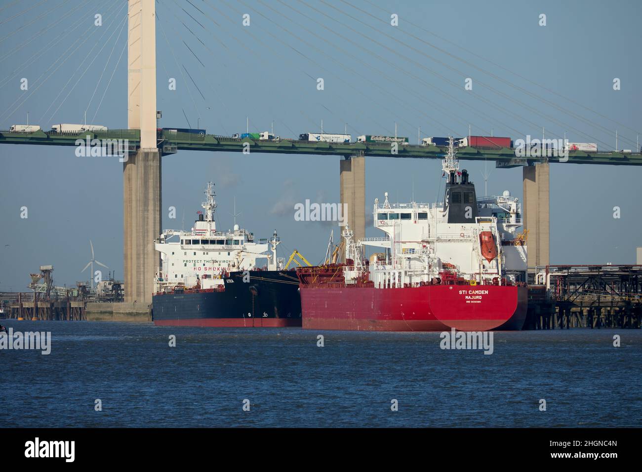 Ships moored at Purfleet docks, with the Dartford Bridge in the ...