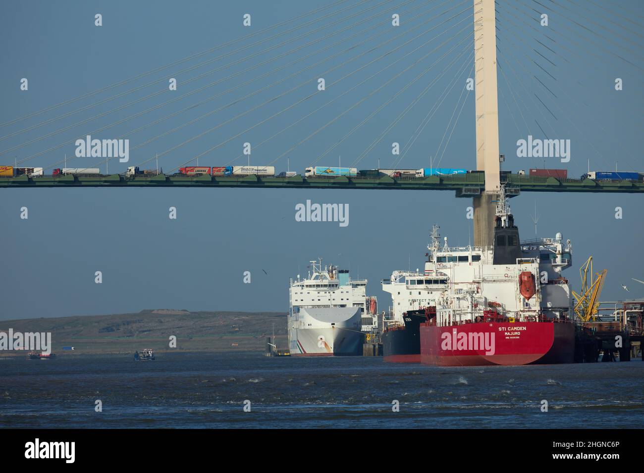 Ships moored at Purfleet docks, with the Dartford Bridge in the ...