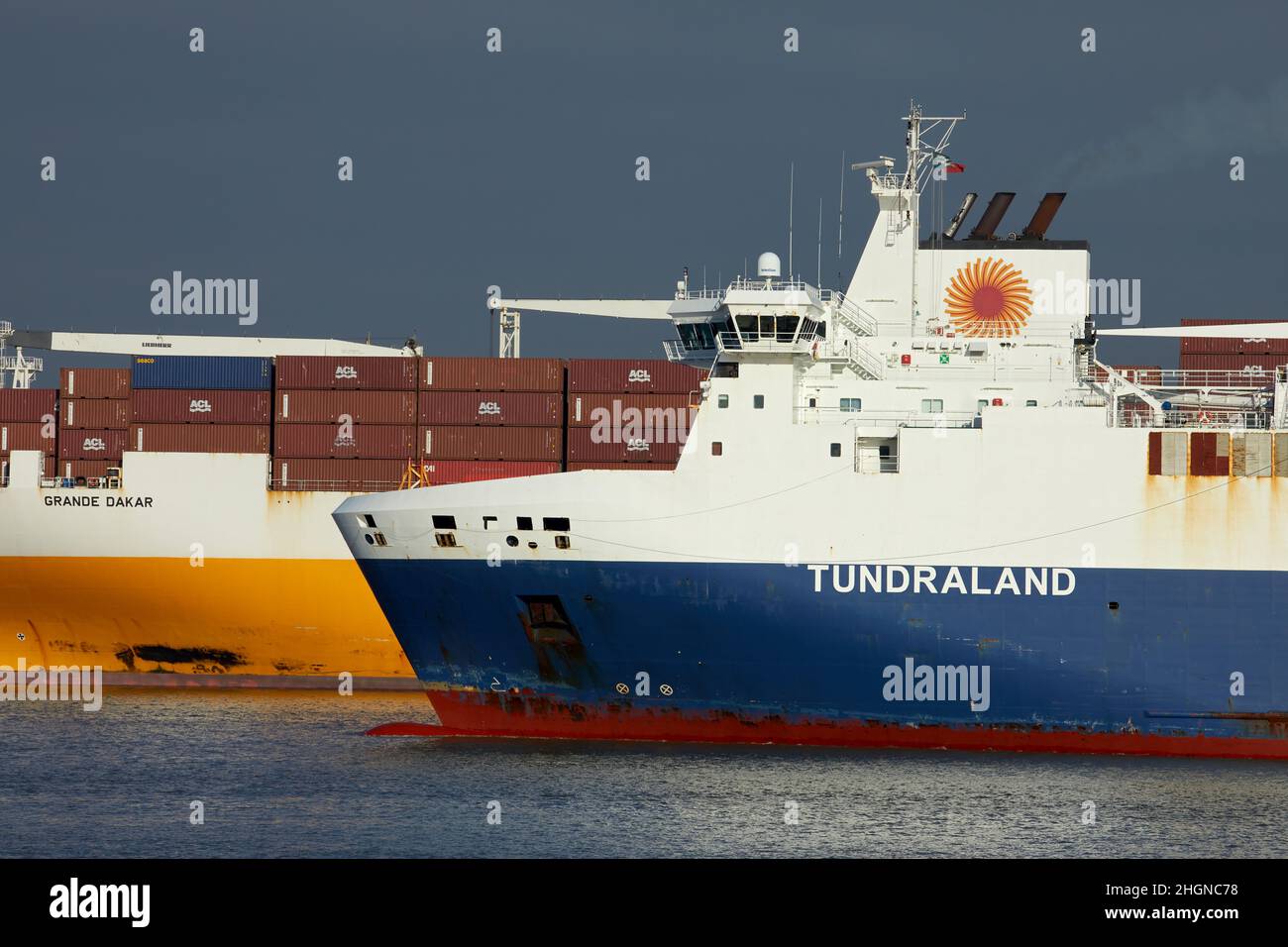 The Tundraland Ro-Ro cargo ship passing the Grande Dakar which is ...