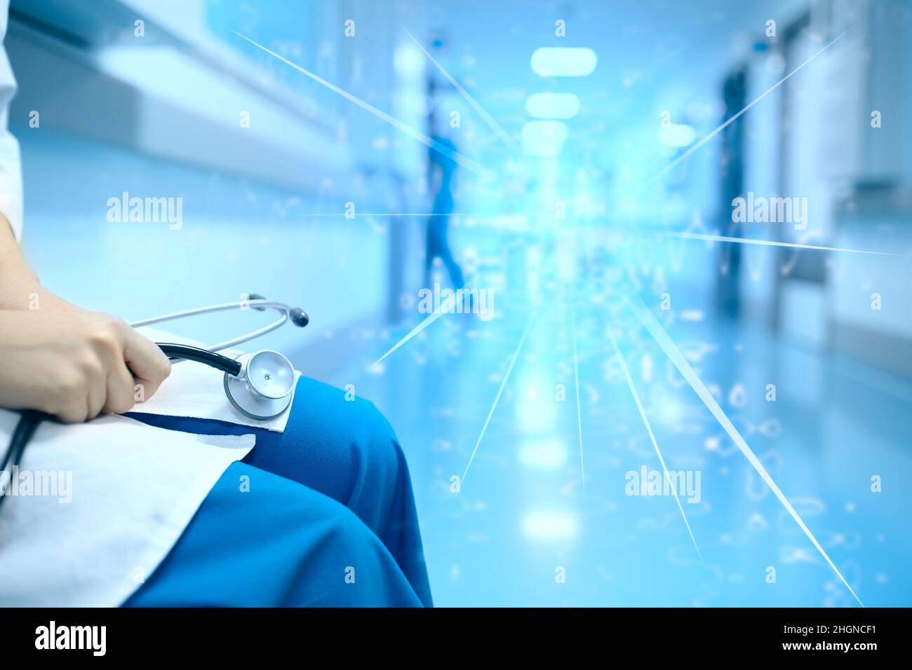 Female doctor with the stethoscope in the hands sitting depressed in ...