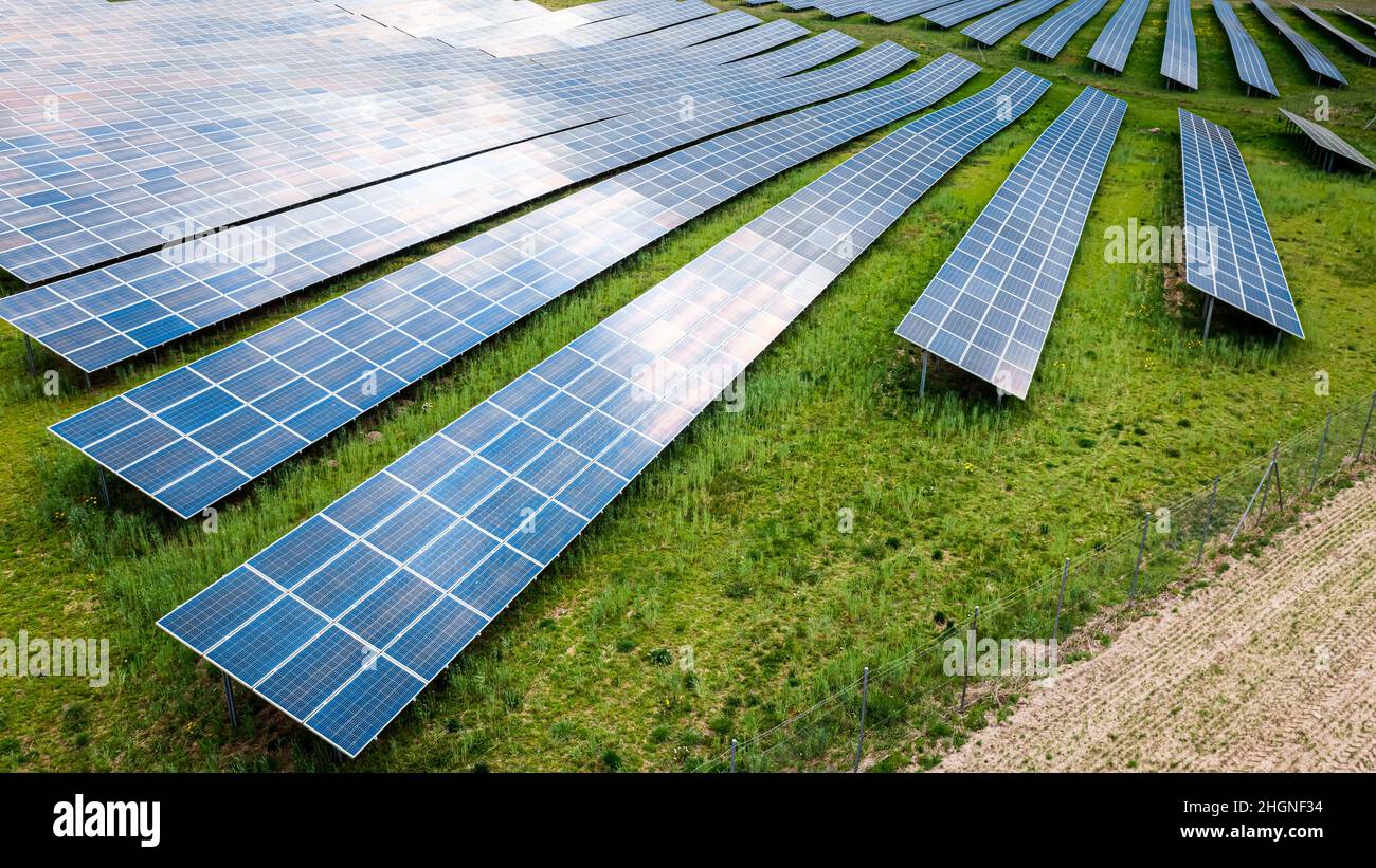 Aerial view of photovoltaic farm as a renewable energy source. Pure ...