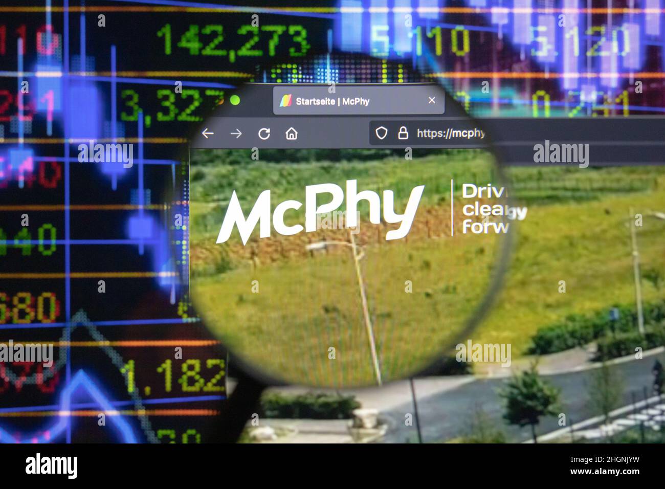 Mcphy company logo on a website with blurry stock market developments in the background, seen on ...