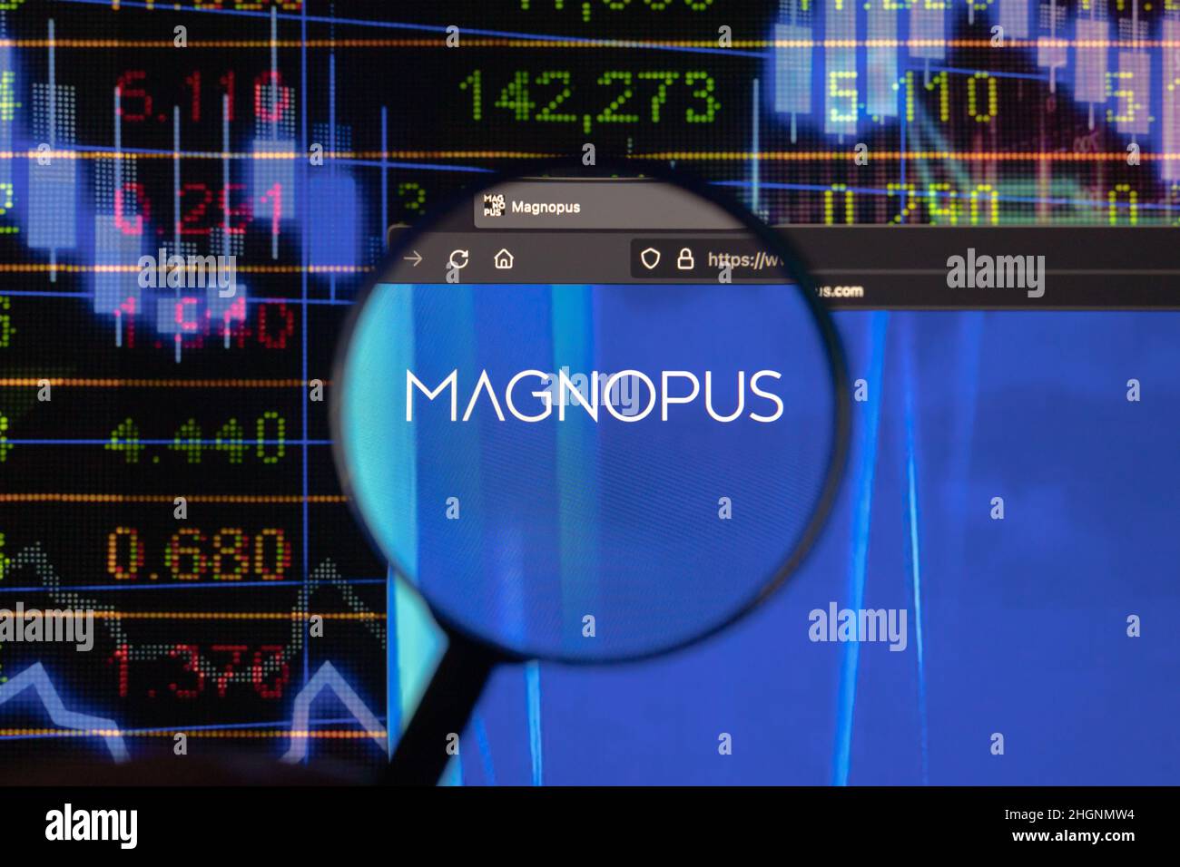 Magnopus company logo on a website with blurry stock market developments in the background, seen ...