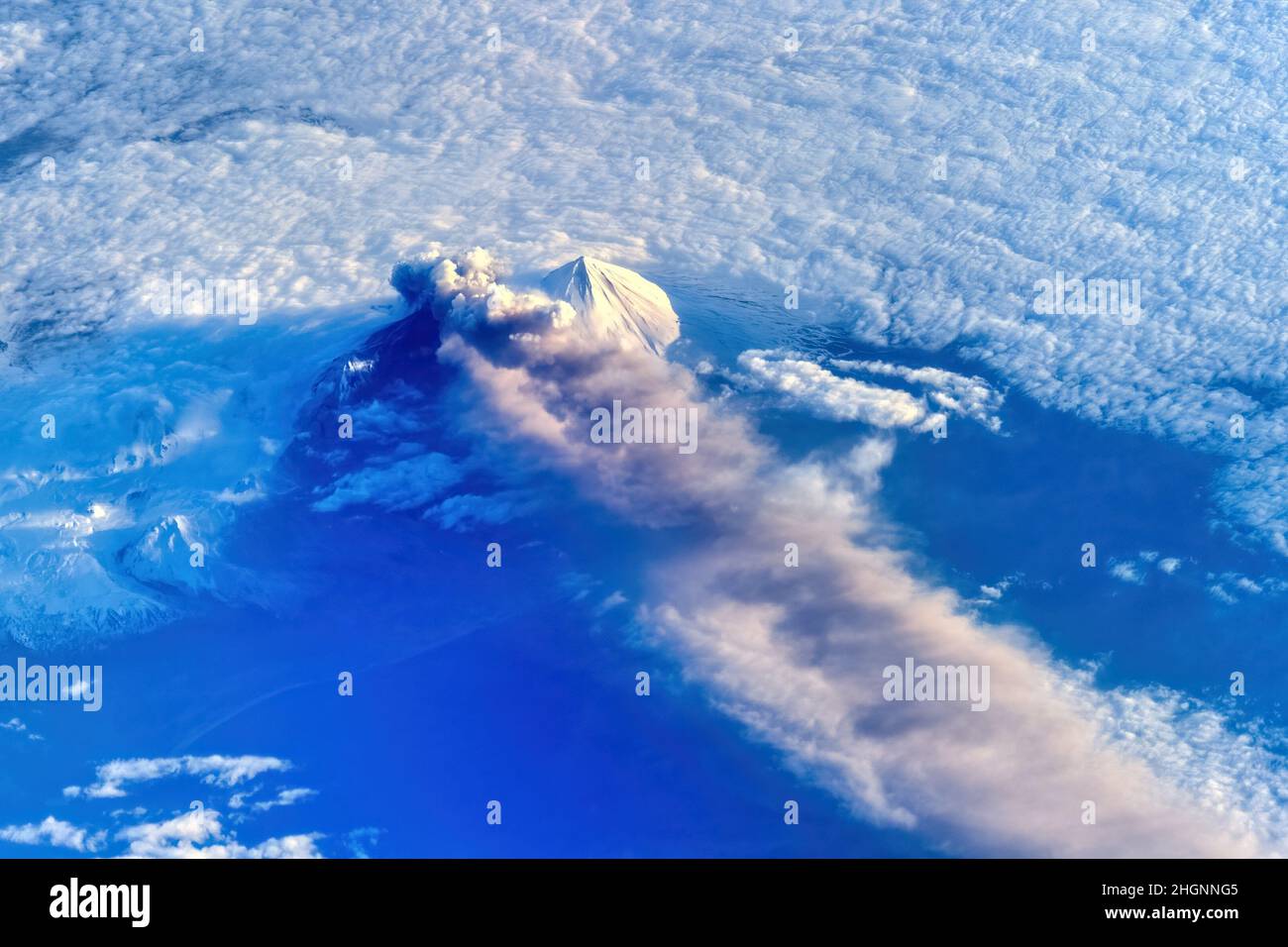 A volcano is seen from space. Digital Enhancement. Elements of this ...