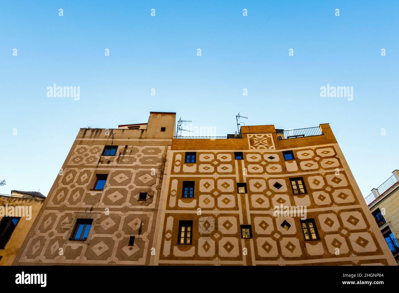 Ornate facade of old Medieval houses in El Borne, Barcelona, Catalonia ...