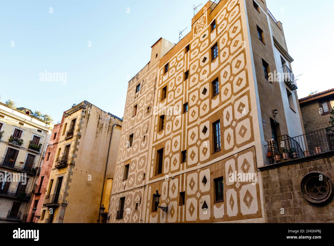 Ornate facade of old Medieval houses in El Borne, Barcelona, Catalonia ...