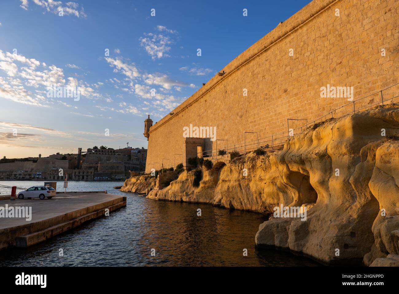 Fort St. Angelo wall at sunset, seaside fortification in Birgu, Malta ...