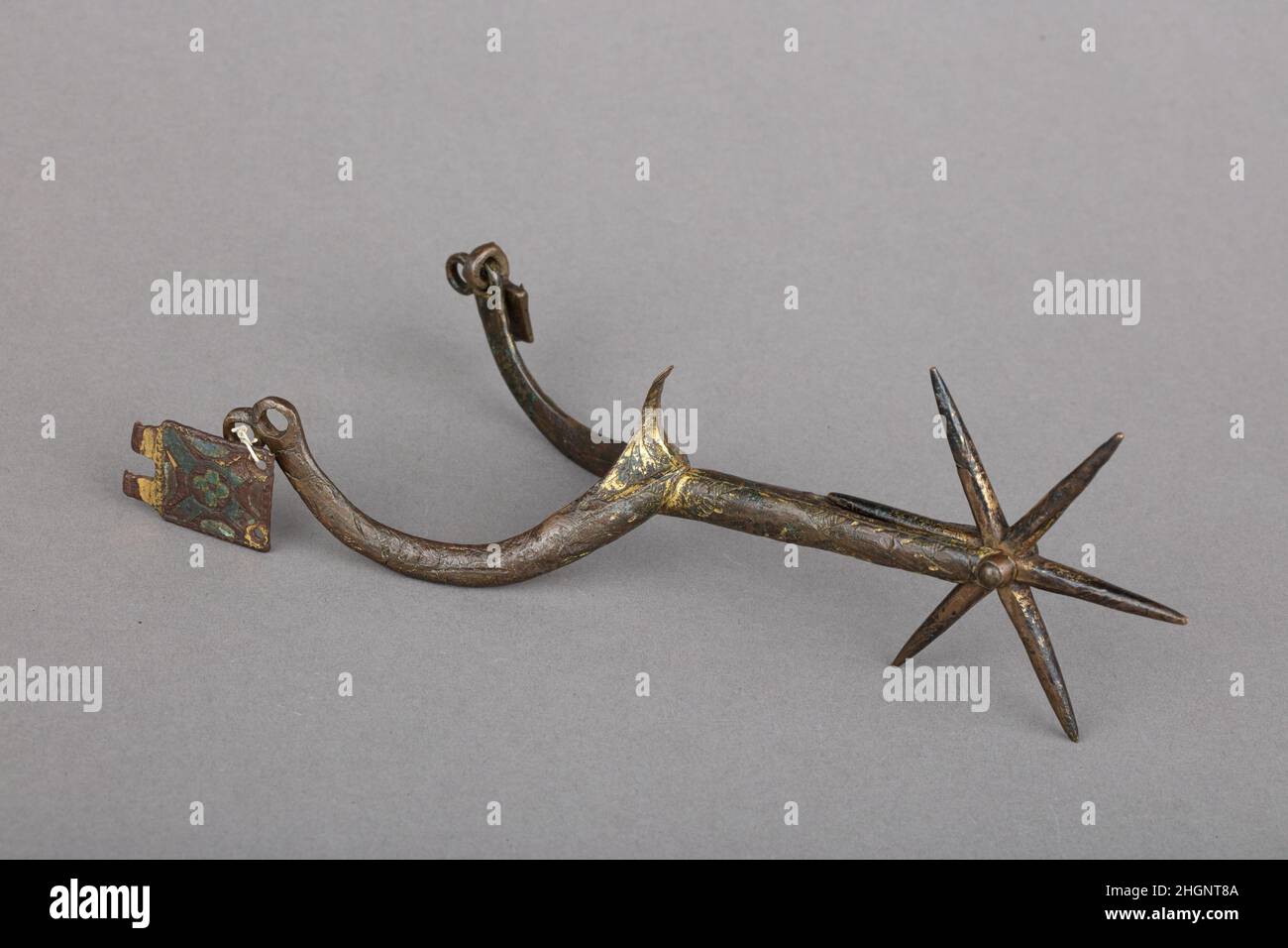 Rowel Spur (Left) ca. 1400 French This gilded spur is engraved overall ...