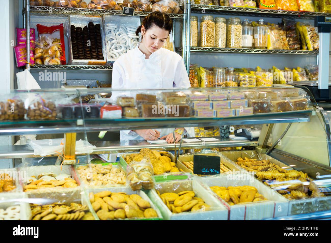 Woman selling cookies hi-res stock photography and images - Alamy