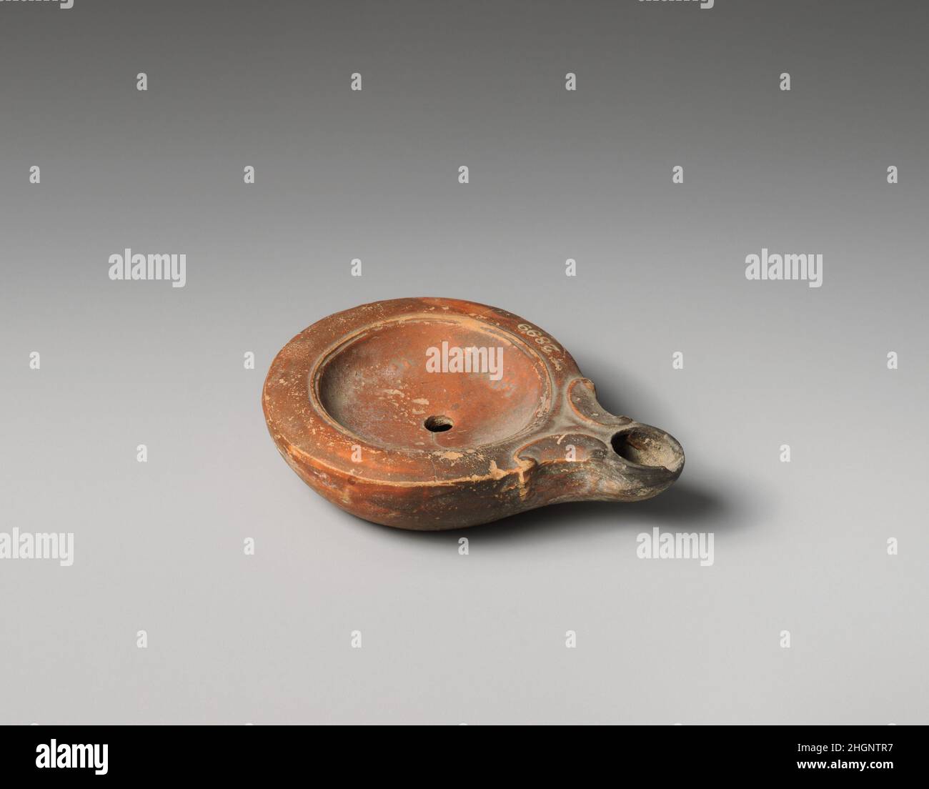 Terracotta oil lamp ca. A.D. 40–100 Roman Loeschcke Type 4. Mold-made ...
