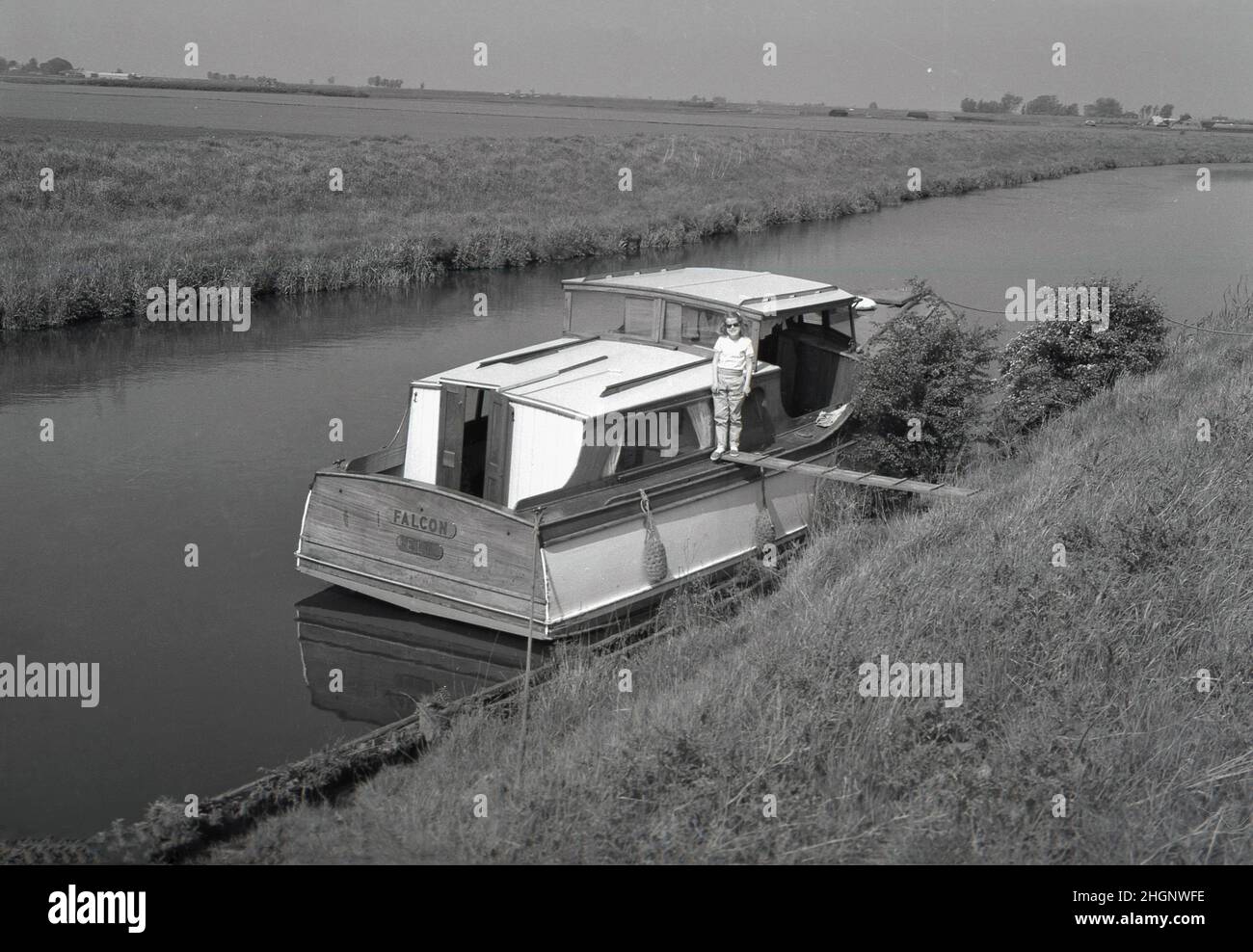 1963, historical, on a boat, a wooden framed motor launch moored on a ...