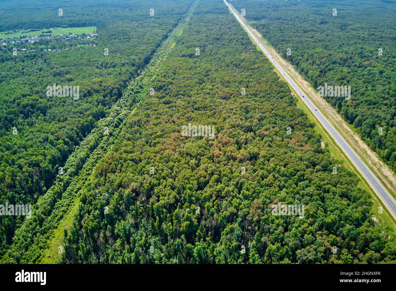 Gas pipeline running parallel to the highway, aerial view Stock Photo ...