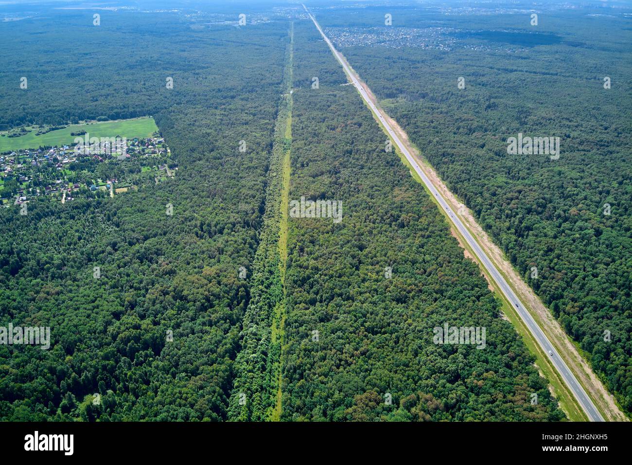 Gas pipeline running parallel to the highway, aerial view Stock Photo ...