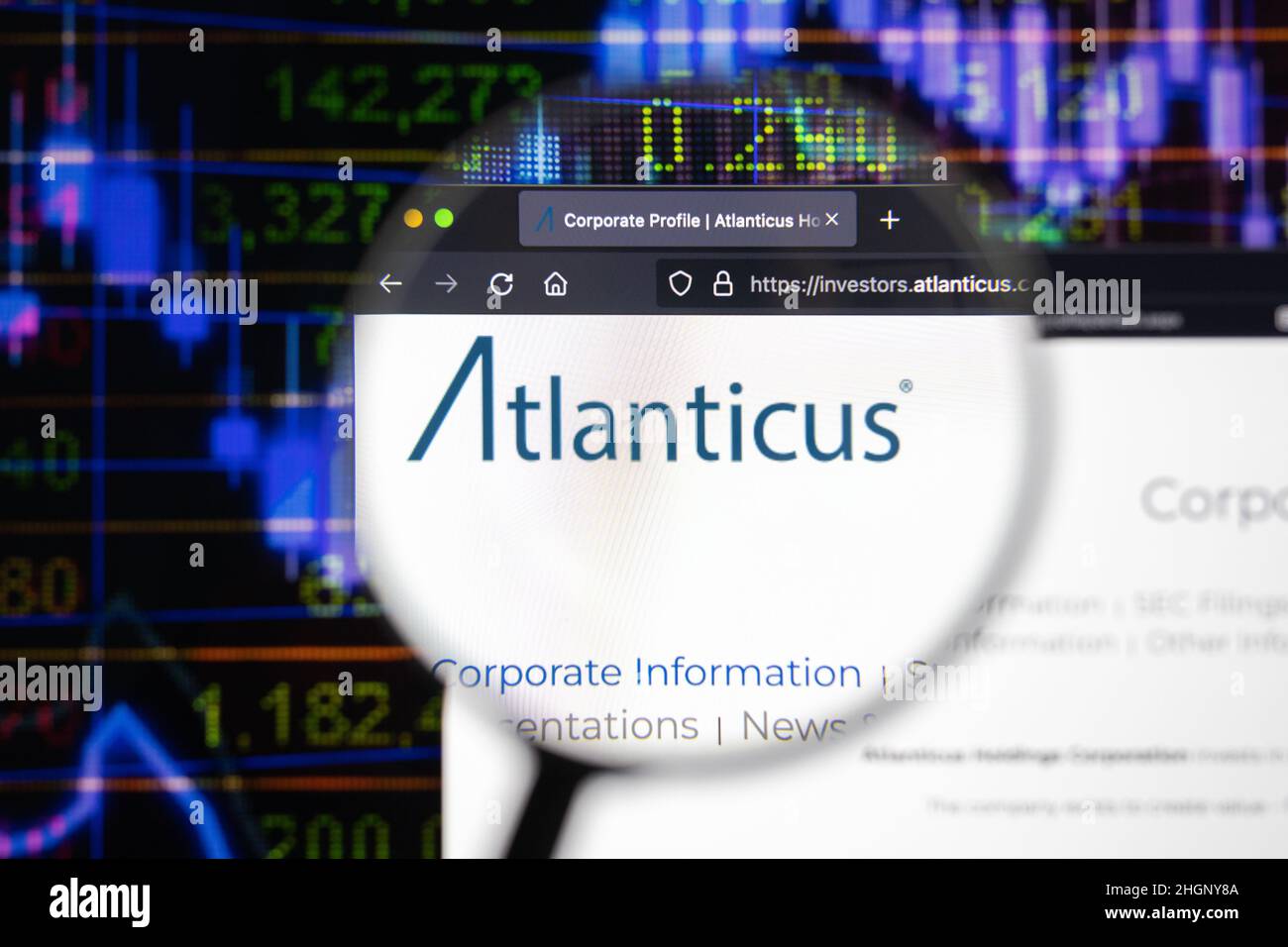 Atlanticus company logo on a website with blurry stock market ...