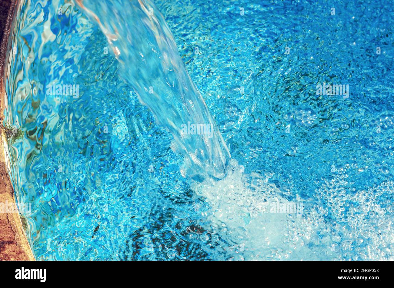 Falling stream of fresh clean spring water. Energy of nature Stock ...