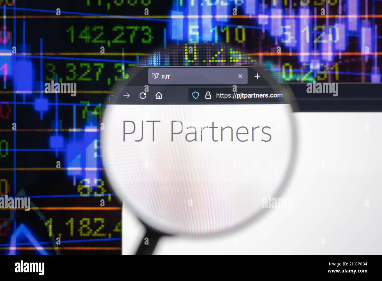 PJT Partners company logo on a website with blurry stock market ...