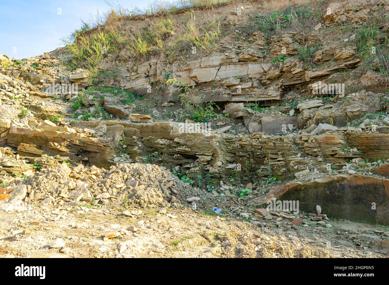 Quarry for natural stone mining. Stone wall in nature Stock Photo - Alamy
