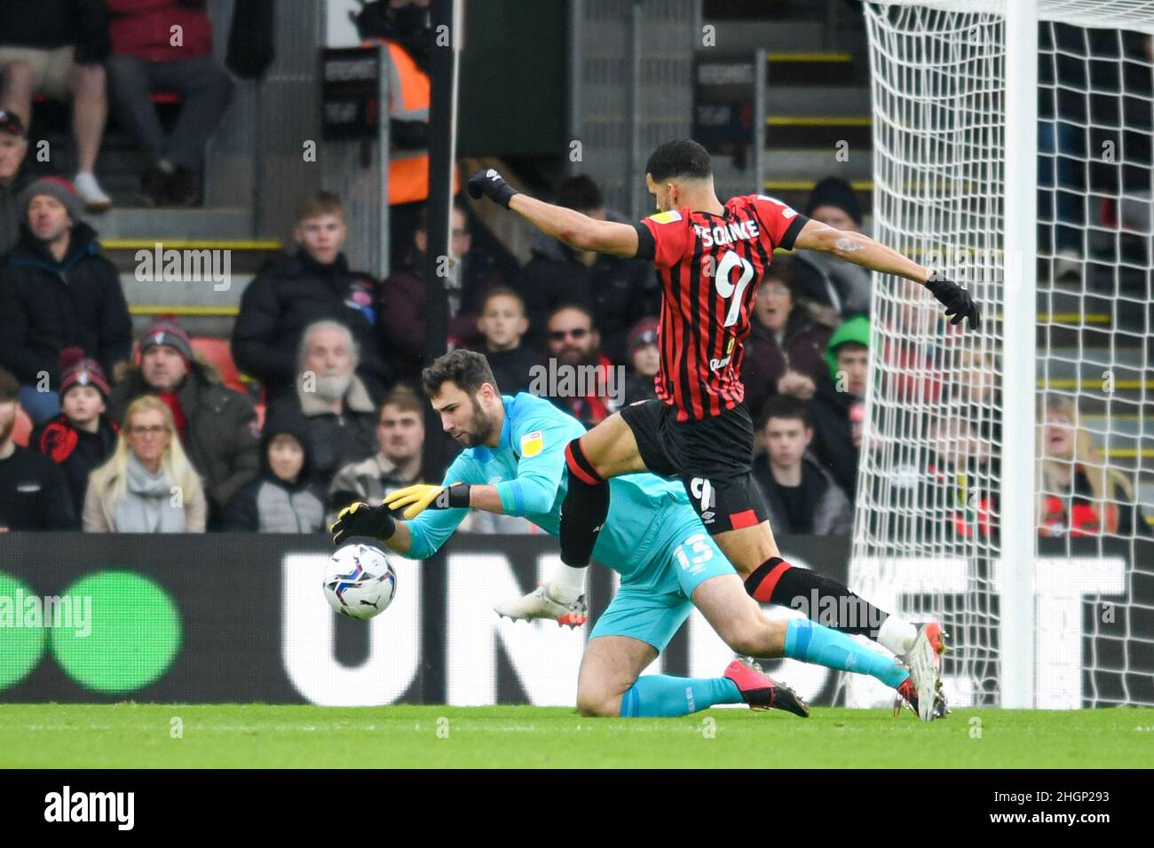 Nathan Baxter #13 of Hull City makes a save at the feet of Dominic ...