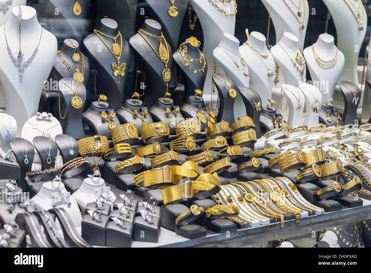 Jewelry shop window with a huge selection of gold jewelry bracelets ...