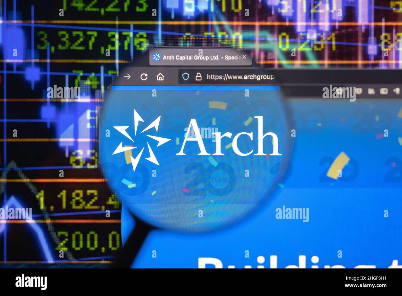 Arch company logo on a website with blurry stock market developments in ...