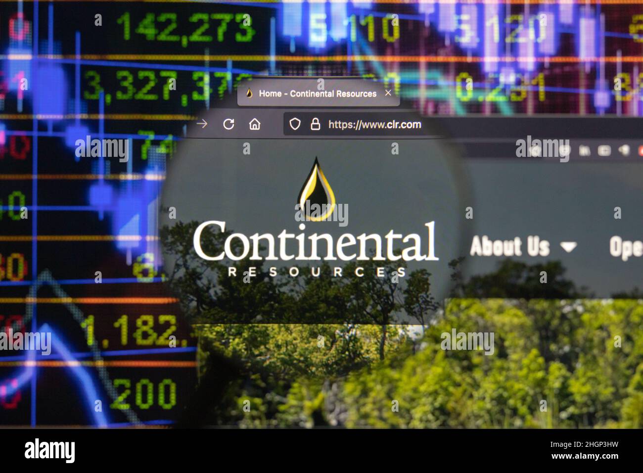 Continental Resources company logo on a website with blurry stock market developments in the ...