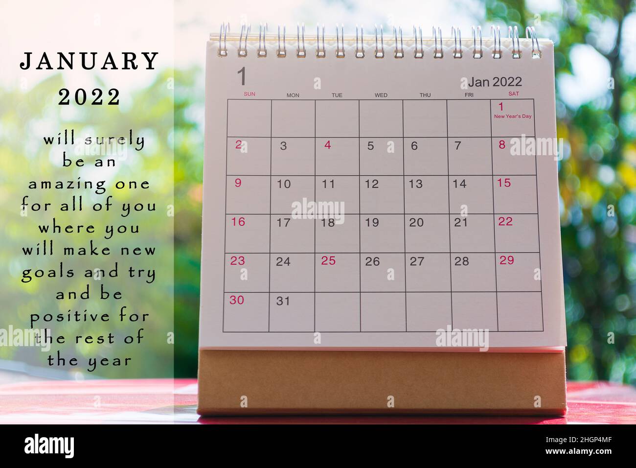 White January 2022 calendar on green background with text. New Year ...