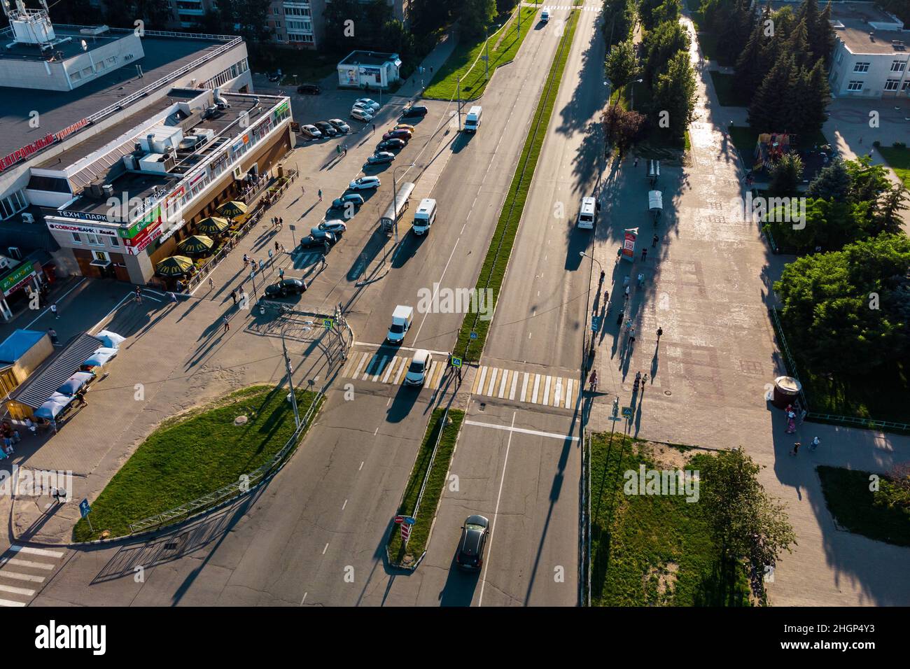 Aerial view of a car road with a pedestrian crossing in the city ...