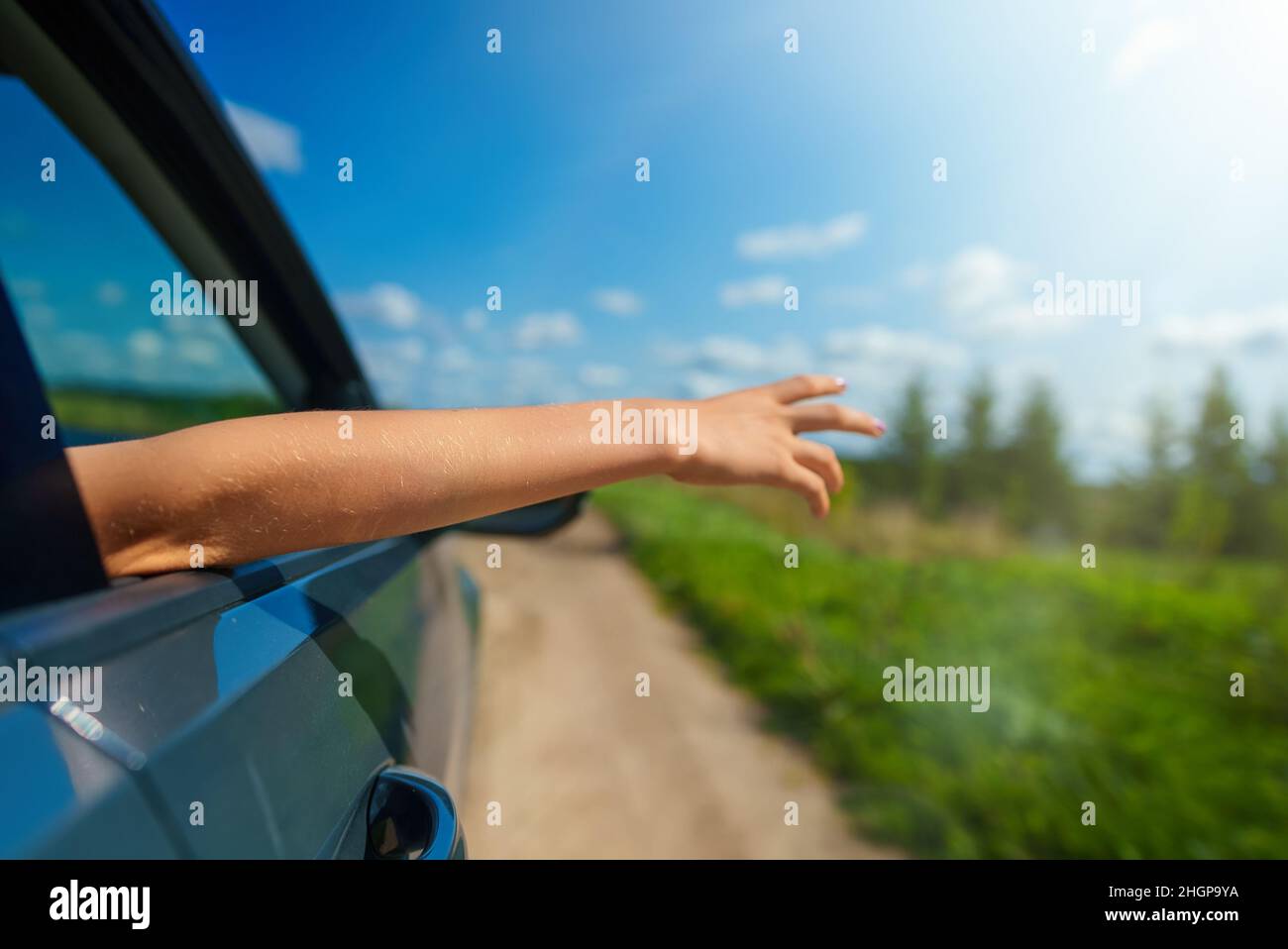 Children's hand outside car window. Summer vacations concept Stock ...