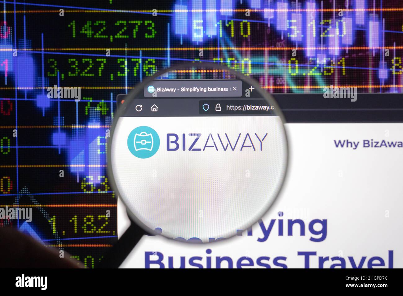 Bizaway company logo on a website with blurry stock market developments ...