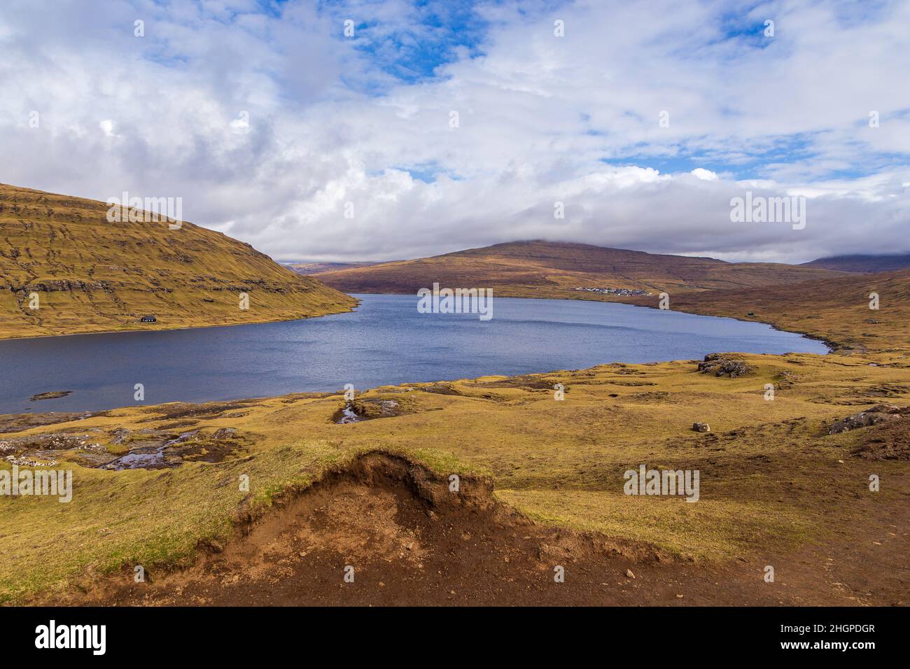 View of the Leitisvatn Lake above the Ocean. Walking area, peat field ...