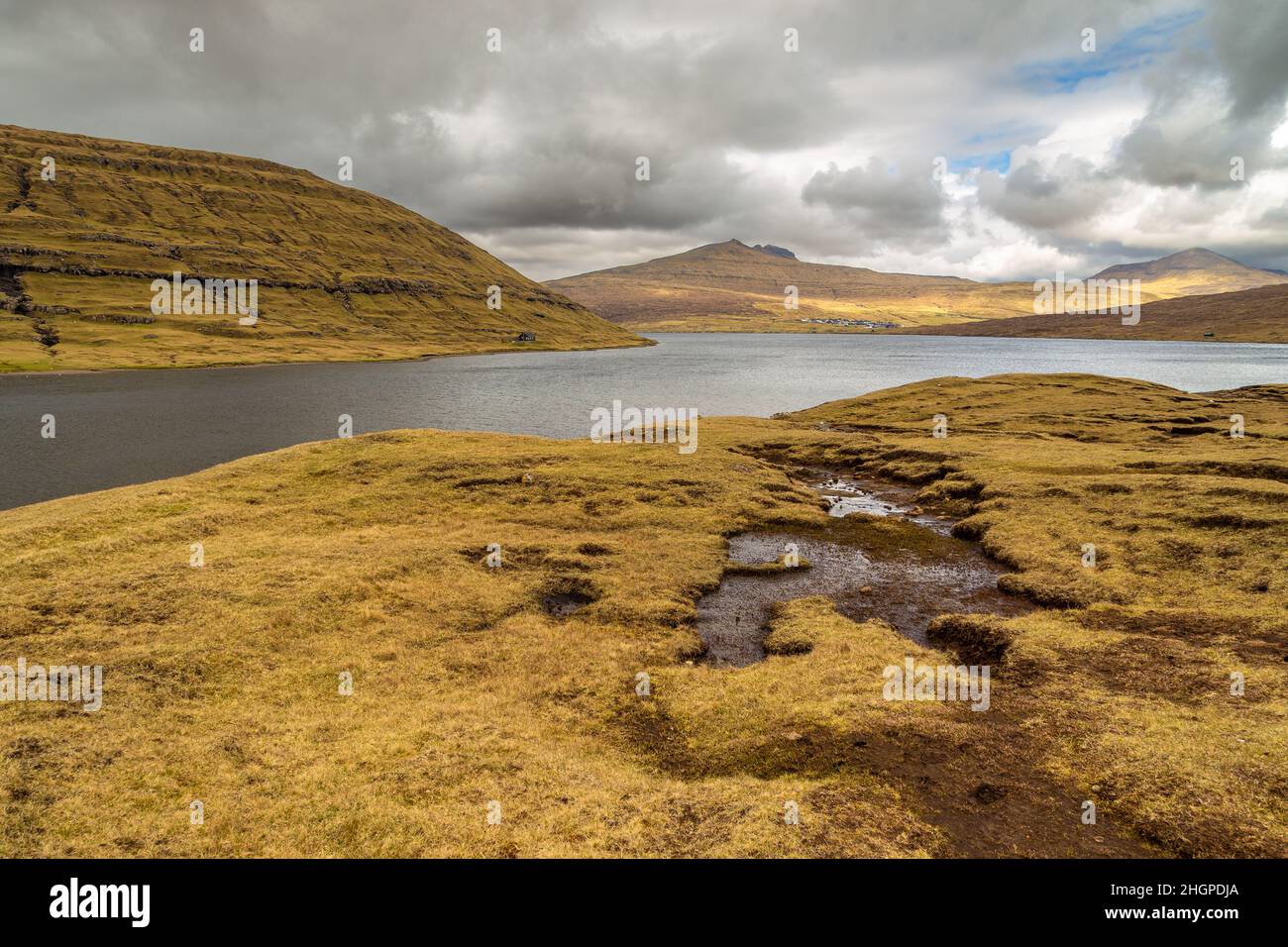 View of the Leitisvatn Lake above the Ocean. Walking area, peat field ...