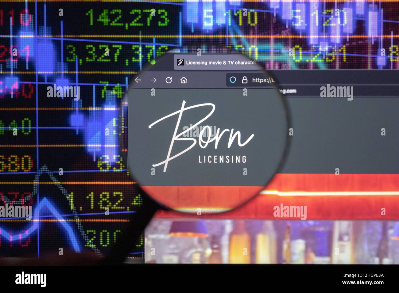Born Licensing company logo on a website with blurry stock market developments in the background ...